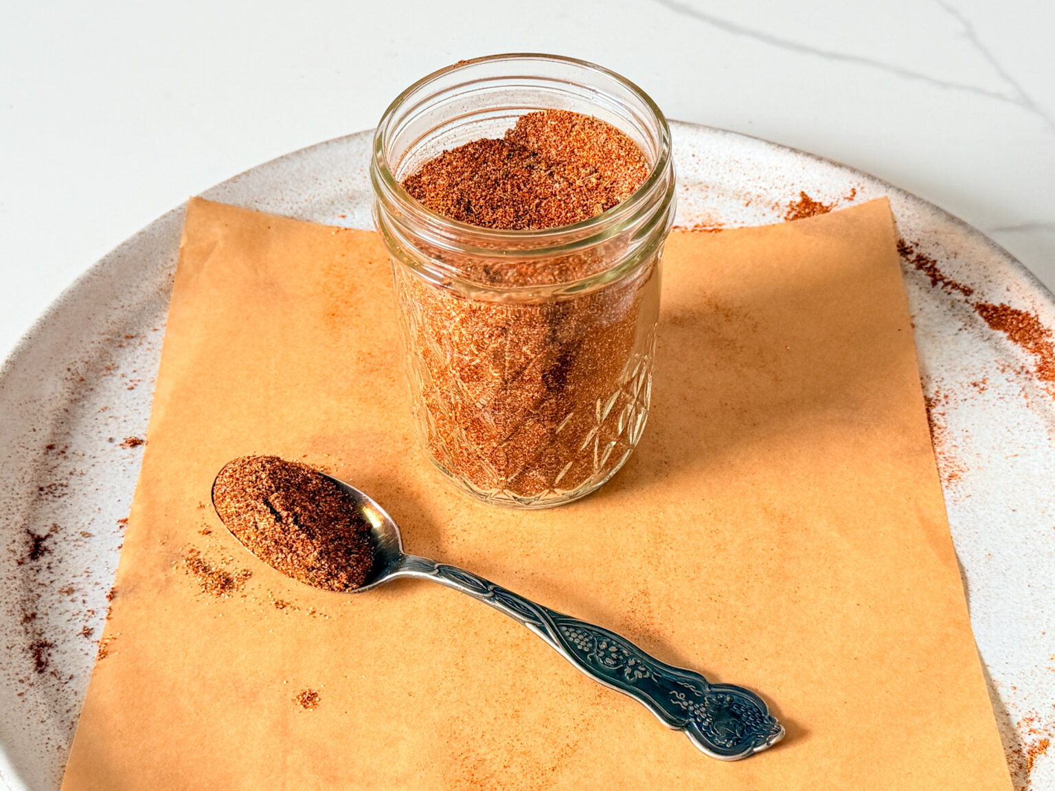 taco spice in a jar with spoon - The Perks of Being Us